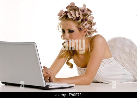Angel with laptop Stock Photo - Alamy