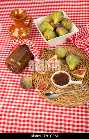 Freshly picked figs and a homemade preserve Stock Photo - Alamy