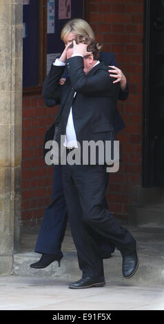 A distraught Ian Beale leves the church after daughter Lucy's funeral ...