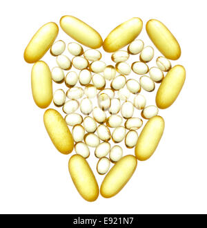 Heart made of fish oil capsules on color background Stock Photo - Alamy