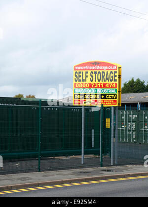 Self storage sign with containers UK Stock Photo - Alamy