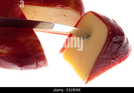 Block of Dutch Edam cheese covered in red rind, close up Stock Photo ...
