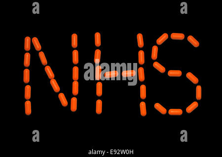 An image of the word NHS made from blue medical pills against a black ...