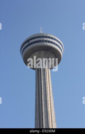 High concrete tower located in a tourist resort area of a big city ...