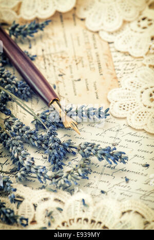 Old letters with dry flowers and book close up Stock Photo - Alamy