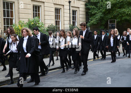 Oxford university students walking in the street on graduation day ...