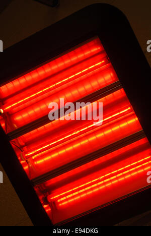 Heater with glowing red heating element for warmth Stock Photo - Alamy