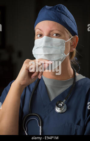Concerned Female Doctor or Nurse Wearing Protective Face Mask Stock ...