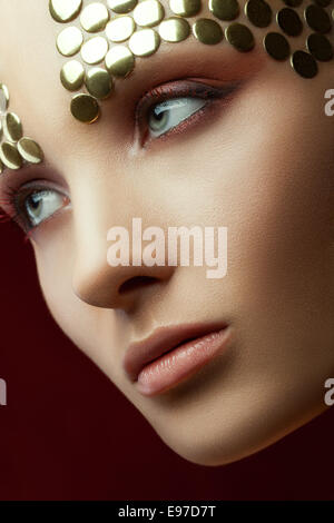 Portrait of a woman with squama-like sequins on her face Stock Photo ...