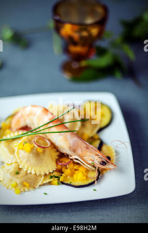 Italian ravioli and shrimp starter with roasted aubergine or eggplant ...
