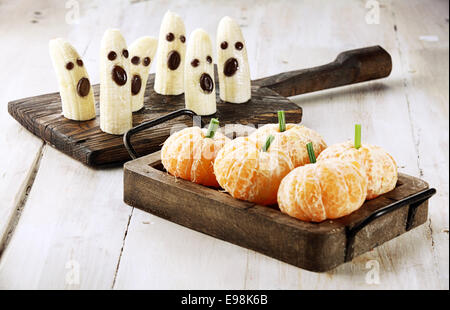 Healthy Fruit Halloween Treats. Banana Ghosts, Clementine Orange ...