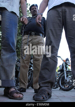 Lahore, Pakistan. 21st Oct, 2014. Pakistani CIA Police Lahore officials ...