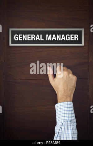 Businessman is knocking on General Manager door for an interview Stock ...