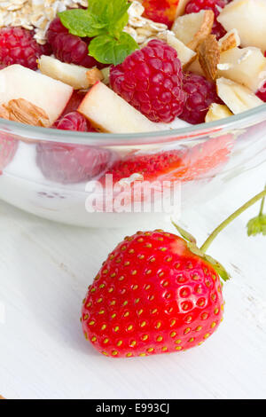 Raspberries, strawberries and apples with yogurt Stock Photo - Alamy