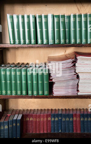 church hymn books on bookshelf Stock Photo - Alamy