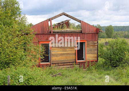 Old fashioned timber house in XIX century village in the middle of the ...