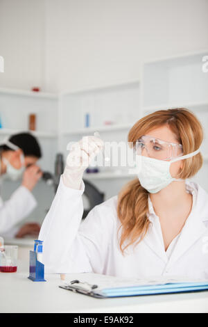 Two scientists carrying out an experiment Stock Photo - Alamy