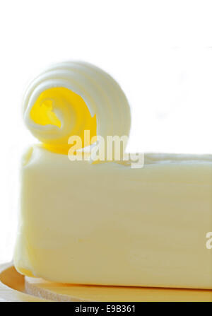 fresh yellow butter served on a wooden board Stock Photo - Alamy