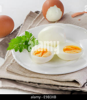 breakfast food, boiled egg, eggs, chopped spring onions, on a hand ...