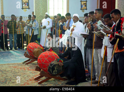 Priests with sticks sing during a vigil in the orthodox rite in the ...