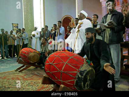 Priests with sticks sing during a vigil in the orthodox rite in the ...