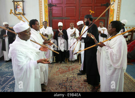 Priests with sticks sing during a vigil in the orthodox rite in the ...