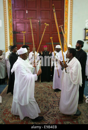 Priests with sticks sing during a vigil in the orthodox rite in the ...