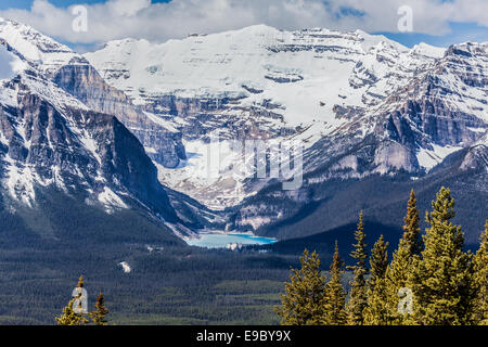 The beautiful landscape of Lake Louise with snowy mountains in Banff ...