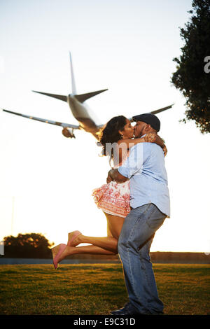 Girl is kissing a guy Stock Photo - Alamy