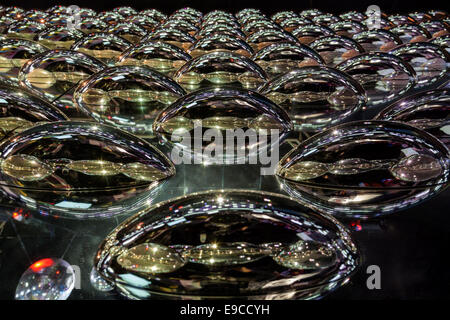 metal rolling oval mirrored as abstract background, bokeh Stock Photo ...