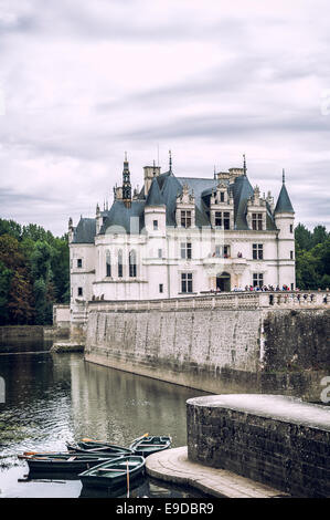 Detail of a golden metal marble staircase railing with a varnished ...