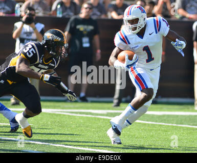 Bulldogs wide receiver Carlos Henderson scores a touchdown just out of ...