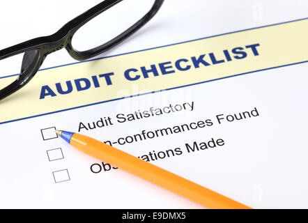Audit checklist form with glasses Stock Photo - Alamy