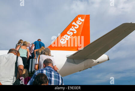 passengers boarding an easyjet aircraft rear steps at Belfast ...