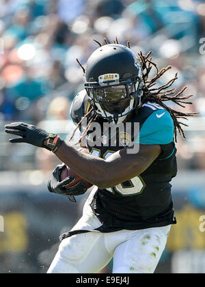 Jacksonville Jaguars running back Denard Robinson (16) dives over the ...