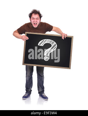 Businessman at desk with question mark Stock Photo - Alamy