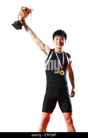 chinese athlete with medal Stock Photo - Alamy