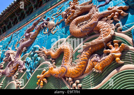 A part of the Nine Dragon Wall in Beihai Park, Beijing, China Stock ...