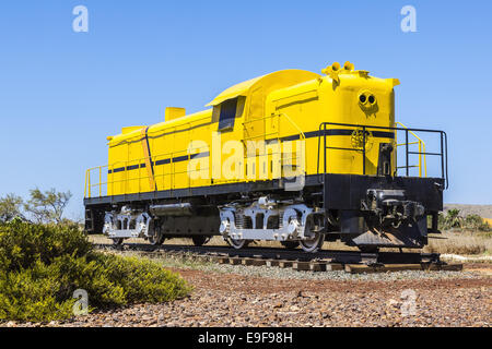 Yellow and Orange Train diesel electric locomotive on the tracks from ...