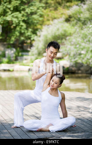 Back View of Yoga Instructor Teaching Yoga Class Stock Photo - Alamy