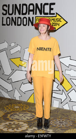 red hat yellow top and trousers Stock Photo - Alamy