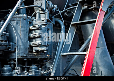 Metal frames and structures around a steam locomotive boiler painted in ...