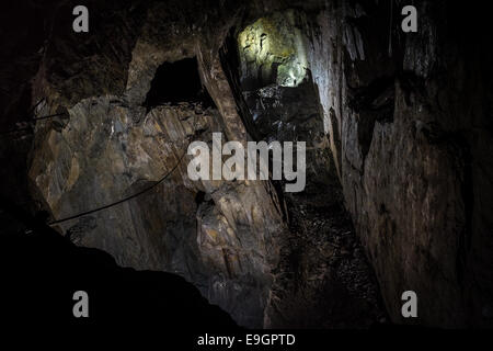 Exploring Moss Head slate mine, Coniston, Cumbria UK Stock Photo - Alamy