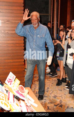 Morgan Freeman attends a press conference after watching a golf game in ...