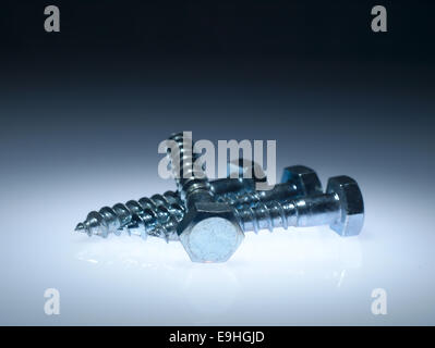Silver screws as seen from up close Stock Photo - Alamy