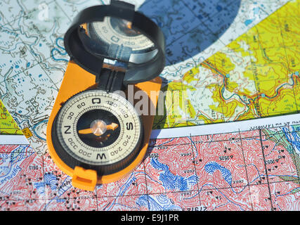 The compass on the map. Open the compass lies on topographic maps and ...