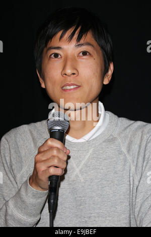 Actor Daichi Tomioka speaks to the audience during the stage greeting ...