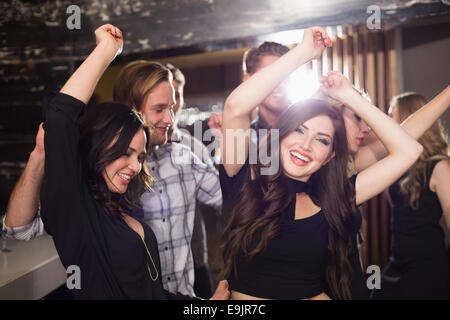 Stylish man smiling and dancing Stock Photo - Alamy