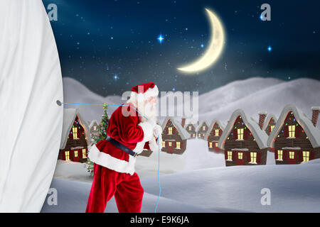 Image of Santa Claus pulling moon with rope Stock Photo - Alamy