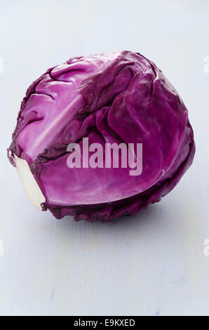 Red cabbage on light blue wooden background Stock Photo - Alamy